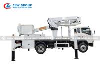 China HOWO 18m Insulated Boom Aerial Work Platform Truck 45kV RHD with Material Handling Jib for sale