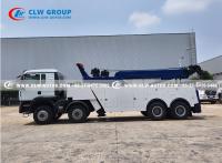 China HOWO 8x4 30 Ton Rotary Wrecker Truck 360° Rotatable Boom Dual 15 Ton Hydraulic Winches for sale