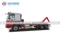China Sinotruk HOWO RHD 6x4 25 Ton Hydraulic Hook Lift Truck Weichai 400HP Engine for sale
