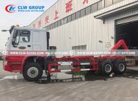 China Sinotruk HOWO RHD 6x4 25 Ton Hydraulic Hook Lift Truck Weichai 400HP Engine for sale