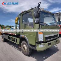China Sinotruk HOWO 4x2 6-Ton Flatbed Wrecker with 5-Ton Winch and Multi-Valve Control Tow Truck for sale