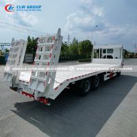 China Sinotruk HOWO 8x4 400HP Flatbed Truck with 9m Manganese Steel Deck and Hydraulic Ramp for Heavy Machinery Transport for sale