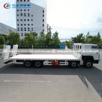 China Sinotruk HOWO 8x4 400HP Flatbed Truck with 9m Manganese Steel Deck and Hydraulic Ramp for Heavy Machinery Transport for sale