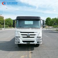 China Sinotruk HOWO 8x4 400HP Flatbed Truck with 9m Manganese Steel Deck and Hydraulic Ramp for Heavy Machinery Transport for sale