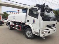 China Dongfeng 10000 Gallon Water Truck with 5000L Capacity, 120hp Engine and 28m Water Cannon Range for sale