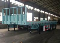 China 3 Axle Flatbed Container Semi Trailer 40ft Length 45000kg Payload with Double Tires for Heavy Cargo Transport for sale
