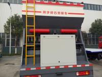 China Intelligent Asphalt Road Tank Truck HOWO 8x4 Synchronous Chip Sealer 9cbm Asphalt 14cbm Gravel for sale