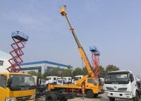 China Automatic 12m Cherry Picker Aerial Lift Truck with 120 HP Diesel Engine and 5100 kg Curb Weight for sale