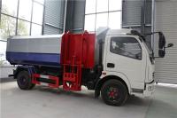 China Dongfeng 4X2 Side Loading Garbage Compactor Truck 8CBM Capacity 143HP Engine Carbon Steel Construction for sale