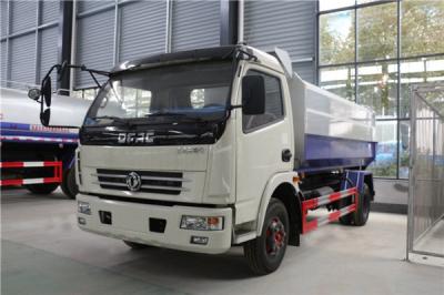 China Dongfeng 4X2 Side Loading Garbage Compactor Truck 8CBM Capacity 143HP Engine Carbon Steel Construction for sale