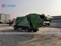 China ISUZU 700P 4x2 6CBM Rear Loader Compressed Garbage Truck 4HK1 190HP Diesel for sale
