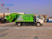 China ISUZU 700P 4x2 6CBM Rear Loader Compressed Garbage Truck 4HK1 190HP Diesel for sale