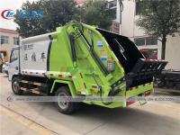 China Dongfeng 4X2 6 CBM Garbage Compactor Truck with 102HP Engine and Carbon Steel Body for Municipal Waste Management for sale