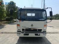 China Sinotruk HOWO 4x2 Platform Towing Truck 4T Flatbed Road Rescue Wrecker 8490mm for sale