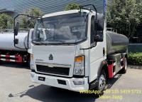 China Sinotruk Howo 4x2 5000L Stainless Steel Milk Transport Tank Truck with CIP Cleaning for sale