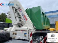 China SINOTRUK HOWO 8x4 LHD Hydraulic Hooklift Garbage Truck 18m3 Container 5t Crane for sale