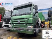 China SINOTRUK HOWO 8x4 LHD Hydraulic Hooklift Garbage Truck 18m3 Container 5t Crane for sale