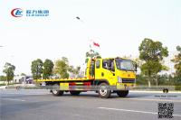 China FAW 4x2 Left Hand Drive Flatbed Towing Truck 120HP 5000kg Capacity for sale
