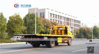 China FAW 4x2 Left Hand Drive Flatbed Towing Truck 120HP 5000kg Capacity for sale
