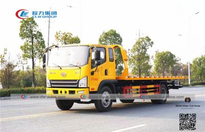 China FAW 4x2 Left Hand Drive Flatbed Towing Truck 120HP 5000kg Capacity for sale