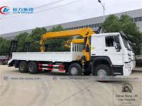 China 8x4 HOWO Flatbed Truck Mounted Telescoping Boom Crane 16T Capacity with 272kW Engine for sale