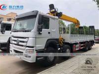 China 8x4 HOWO Flatbed Truck Mounted Telescoping Boom Crane 16T Capacity with 272kW Engine for sale