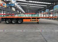 China 40FT 3 Axle 45 Ton Container Loading Flatbed Semi Trailer with Q345B Steel & 1310mm Wheel Base for sale