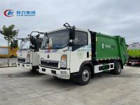 China 140HP 6m3 Howo RHD Rear Load Garbage Truck Waste Collector Truck 6000Liters for sale