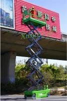 China DC Motor Driving 5.8m Self-propelled Heavy Duty Scissor Lift Loading Capacity 230kg with Extension Platform for sale