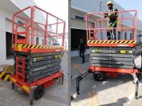 China Self Propelled 14m Mobile Scissor Lift Movable Battery Electric Hydraulic Aerial Working for sale