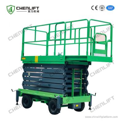 China 9 Meters High Mobile Scissor Lift Aerial Work Platform 500Kg Loading Capacity In Green for sale