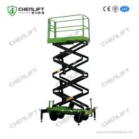 China 6 Meters Semi-Electric Mobile Scissor Lift Man Lifts in Green 1 Ton Capacity for sale