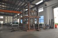 China Save Space 4M Lifting Height 2000Kg Loading Capacity Guide Rail Elevator for Steel Structure Workshop for sale