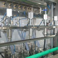 China Stainless Steel 304 Multi-Nozzle Olive Oil Filling Machine for Popular Bottling Line for sale