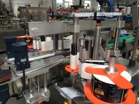 China Food Bottle Labeling Machine with Date Code Printer and Automatic Screw Capping Advantage for sale