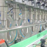 China 10 Head Piston Hot Filling Aluminum Foil Sealer Follow Capping Machine for Motor Oil for sale