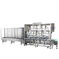 China High output 5-head weighing filling machine with Filling capacity of 10-50KG/barrel for sale