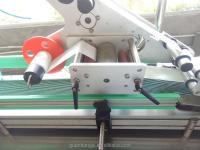 China Motor Core Components Automatic Plastic Bag Labeling Machine for Box/Bottle Packaging for sale