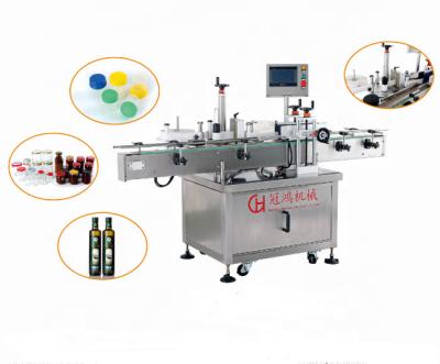 China Vertical Positioning Sticker Labeling Machine for Round Liquor/Beer/Wine Bottles for sale