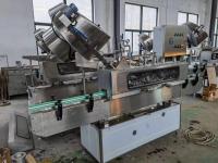 China Video Inspection Provided Automatic Steam Type Vacuum Capping Machine for Glass Bottles for sale