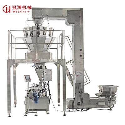 China Automatic Multi Nozzles Weighing Filling Machine for Candy Nuts Food Simple Operation for sale