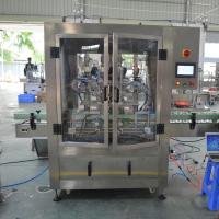 China Automatic 4 Head Hot Piston Filling Machine for Hair Gel/Wax Program Control Filling for sale