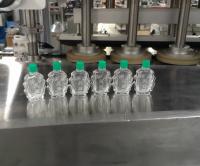 China Small Capacity Glass Bottle Capping Machine for Essential Oil and Medicated Oil Cap for sale