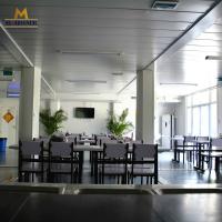 China Cafeteria Flat Pack Steel Structure Sandwich Panel Container House for sale