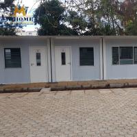 China Prefabricated Portable Container House Flat Pack Steel Frame  Sandwich Panel Container House for sale