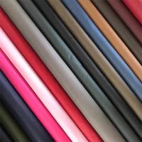China 54/55 Inch Synthetic Leather Fabric 0.8-1.2mm Thickness 1.2-1.5kg/m Weight for Furniture & Apparel for sale