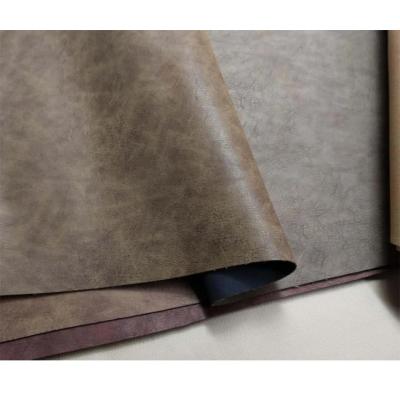 China Custom Printed Faux Leather Fabric 54/55 Inches Wide 0.8-1.2mm Thickness with UV Protection and Abrasion Resistance for sale