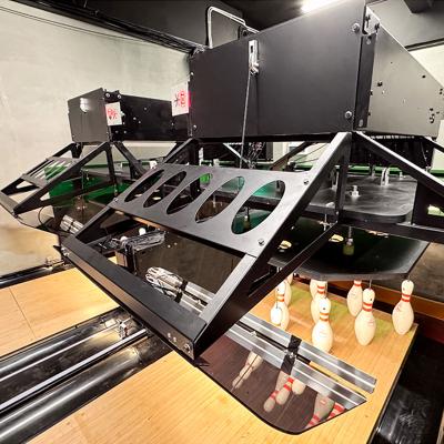 China Coin Operated Bowling Machine with Rubber and Wooden Materials for Indoor Entertainment 2000 kg Capacity for sale