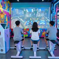 China Virtual Fitness Spinning Bike Interactive Motion Sensing Resistant Stationary Cycling Bike Screen Projection Sports Machine for sale