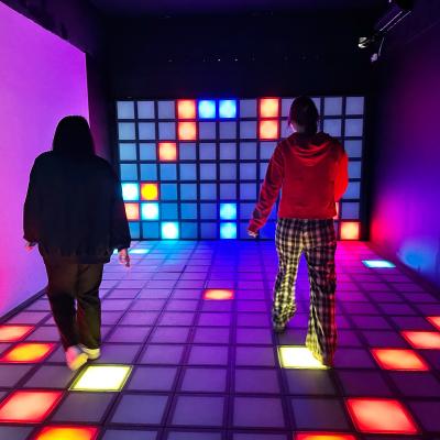 China 30x30cm RGB Interactive LED Floor Gaming Light Tiles for Multiplayer Super Grid Game for sale